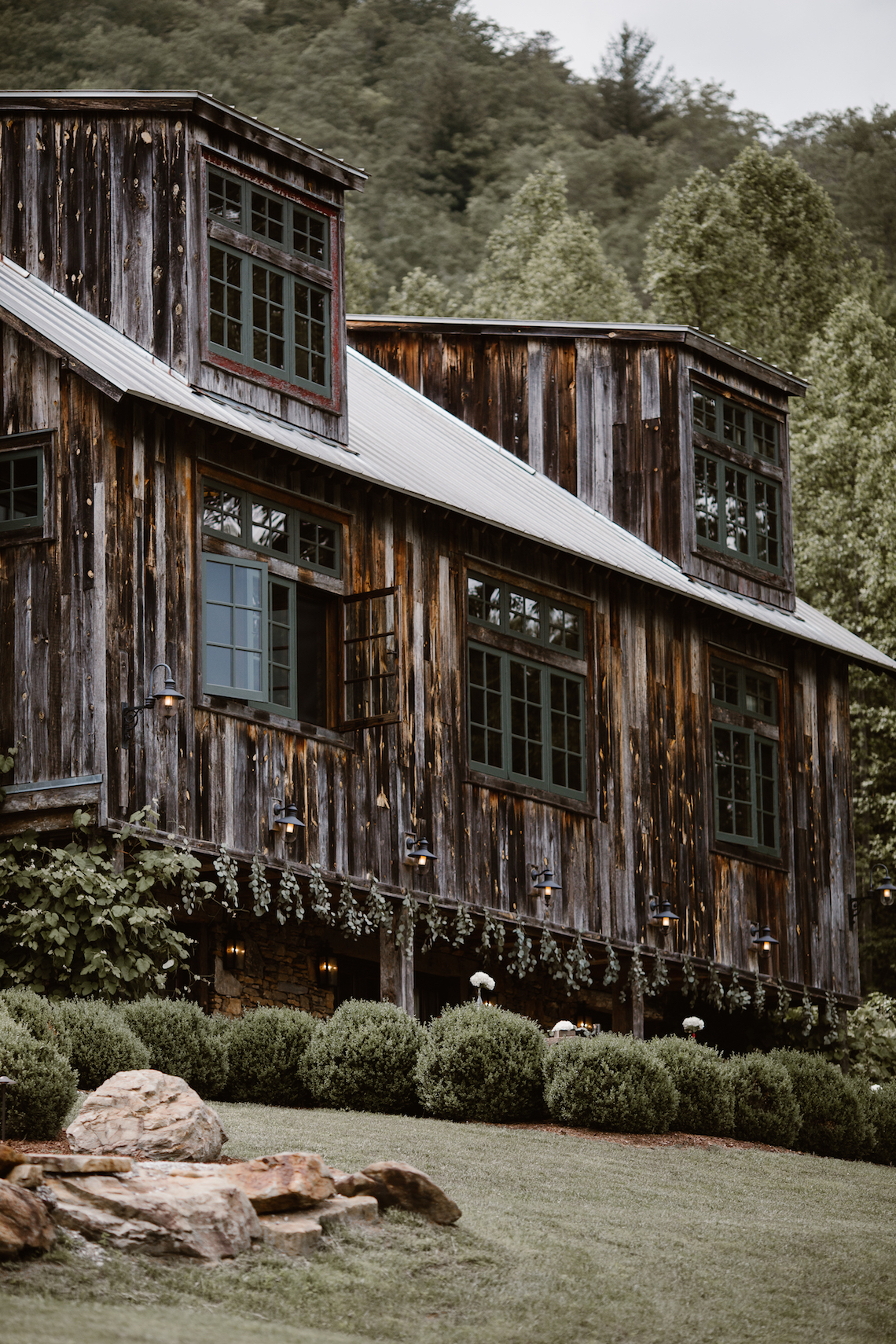 Classic brides will swoon over the florals on this rustic, cabin wedding